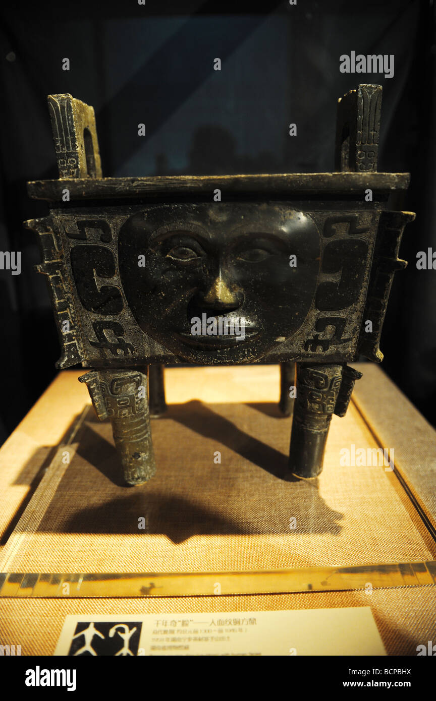 Bronze ceremonial vessel Ding with human face from late Shang Dynasty ...