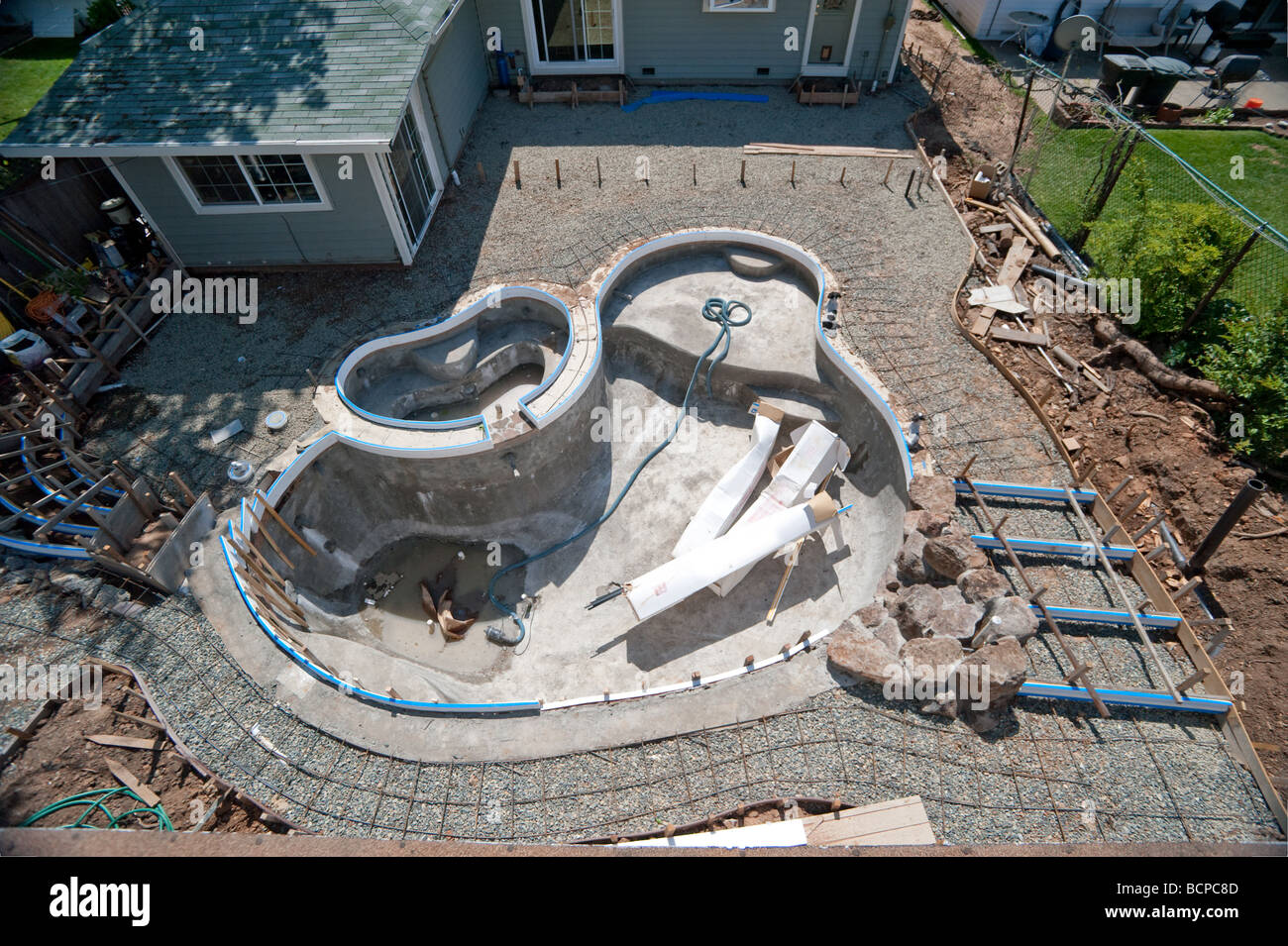 backyard swimming pool under construction Stock Photo - Alamy