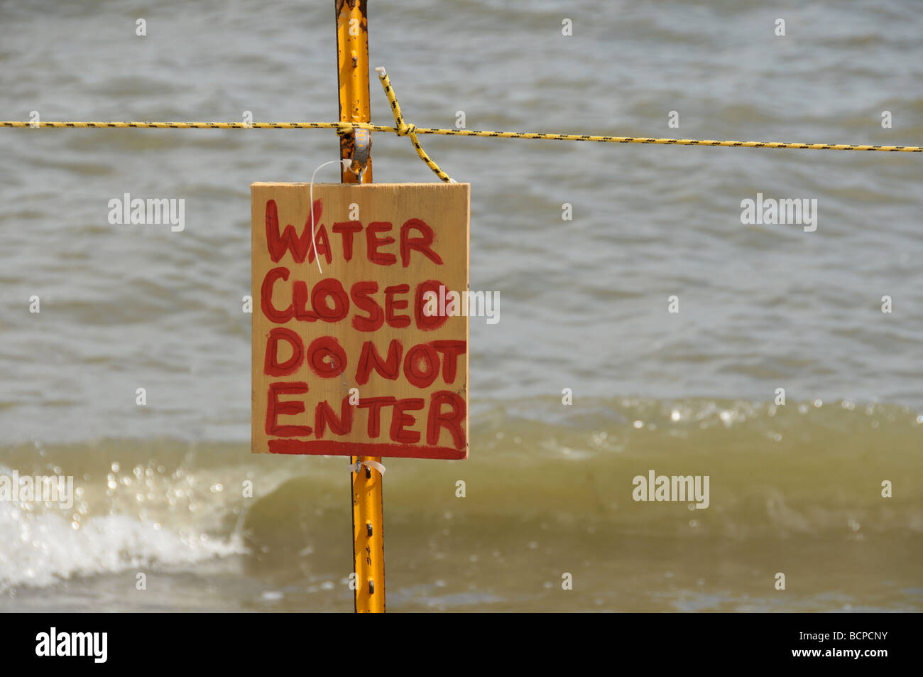 Pollution warning on beach hi-res stock photography and images - Alamy