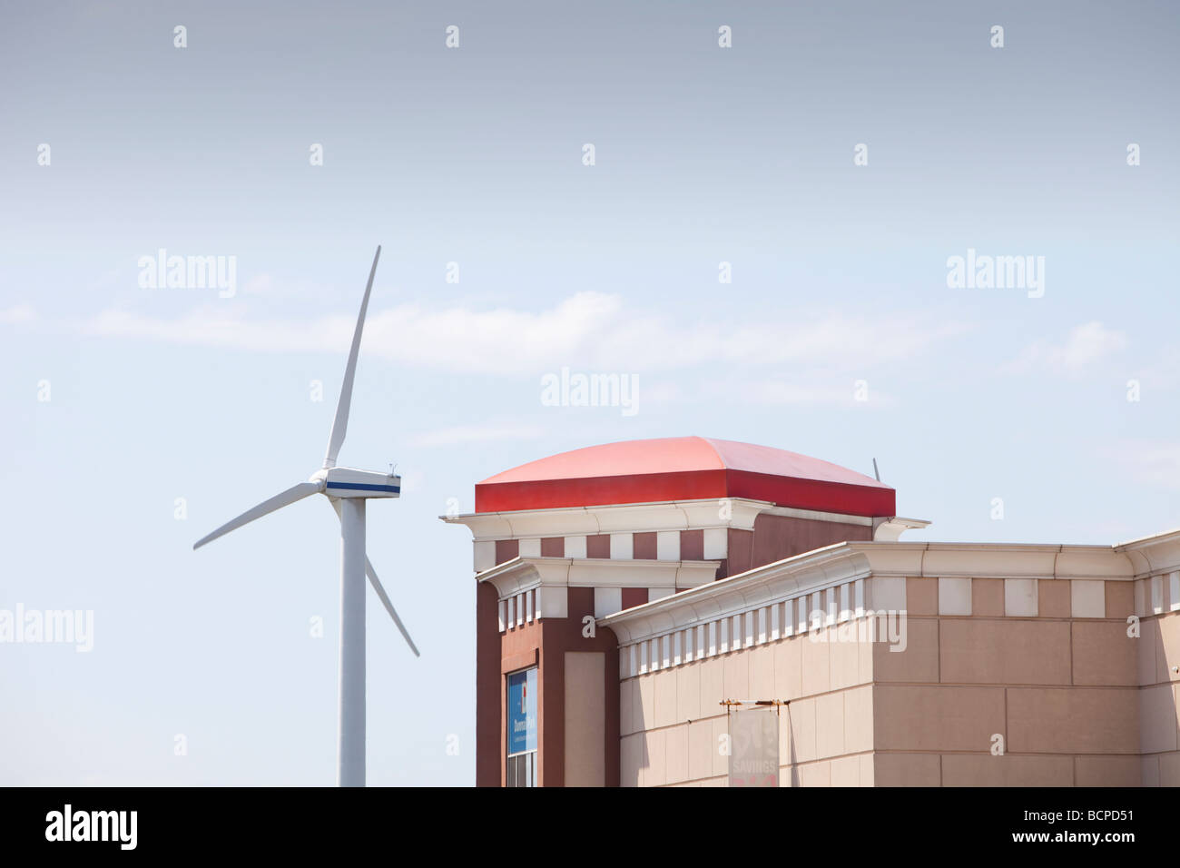 Wind turbines producing renewable electricity at a shopping centre on ...