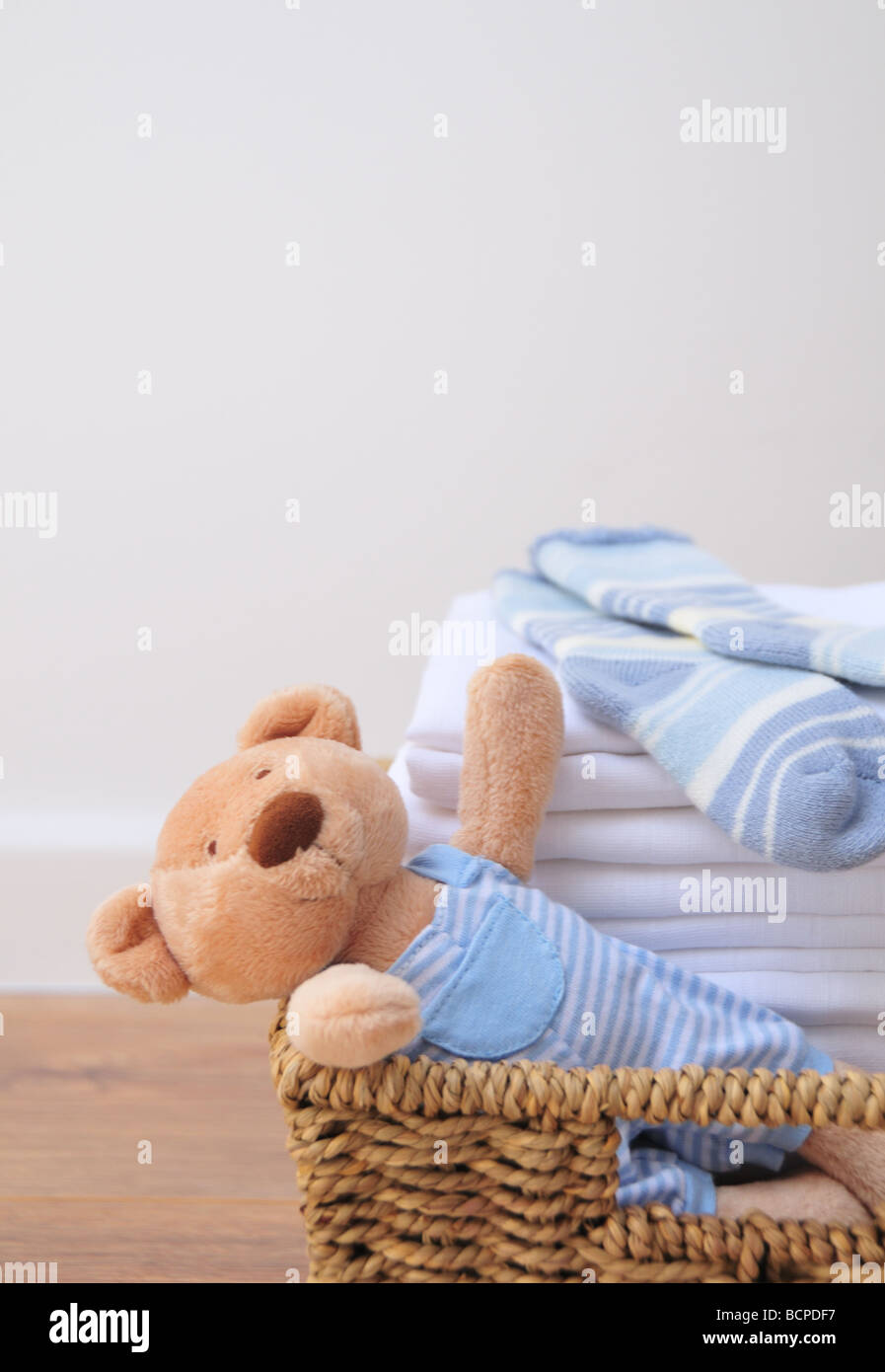 Baby still life with a traditional teddy bear, muslim squares and a ...