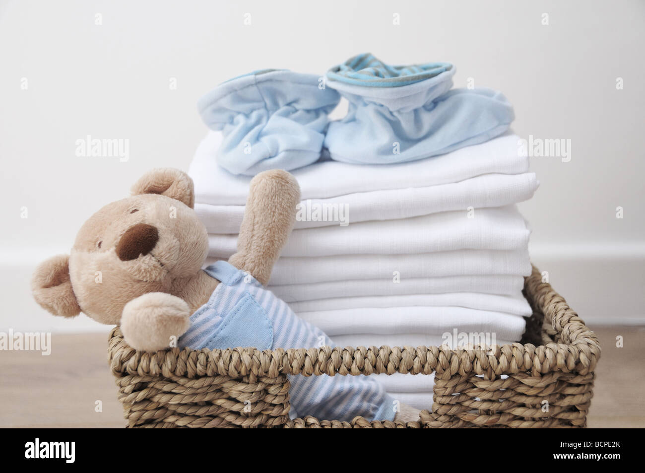 Baby still life with a traditional teddy bear, muslim squares and a ...