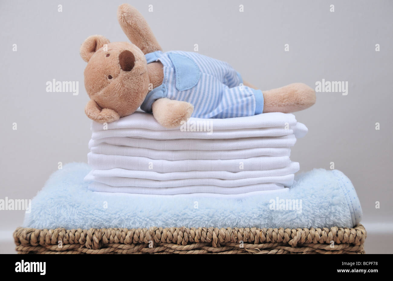 Baby still life with a traditional teddy bear, muslim squares and a ...