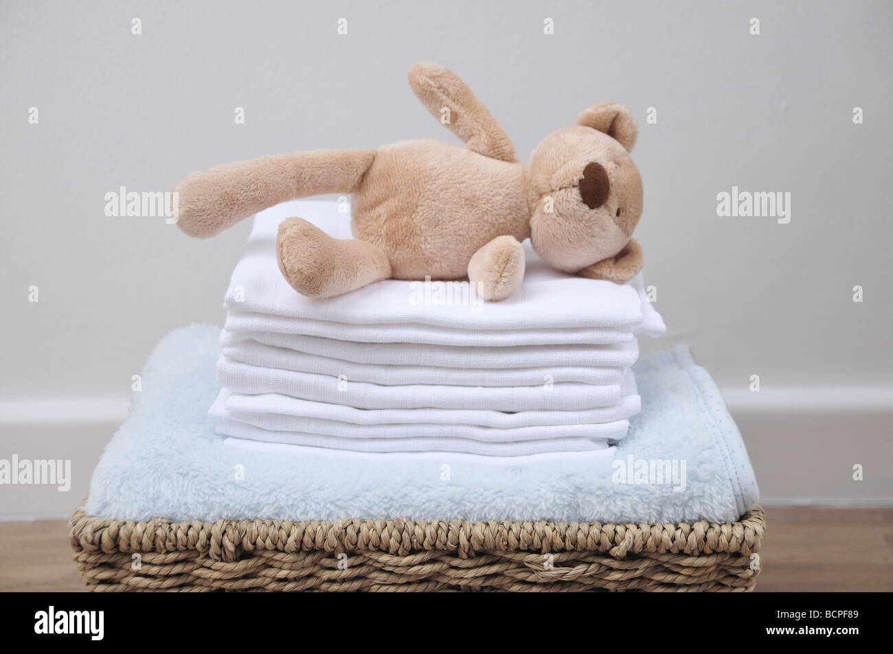 Baby still life with a traditional teddy bear, muslim squares and a ...