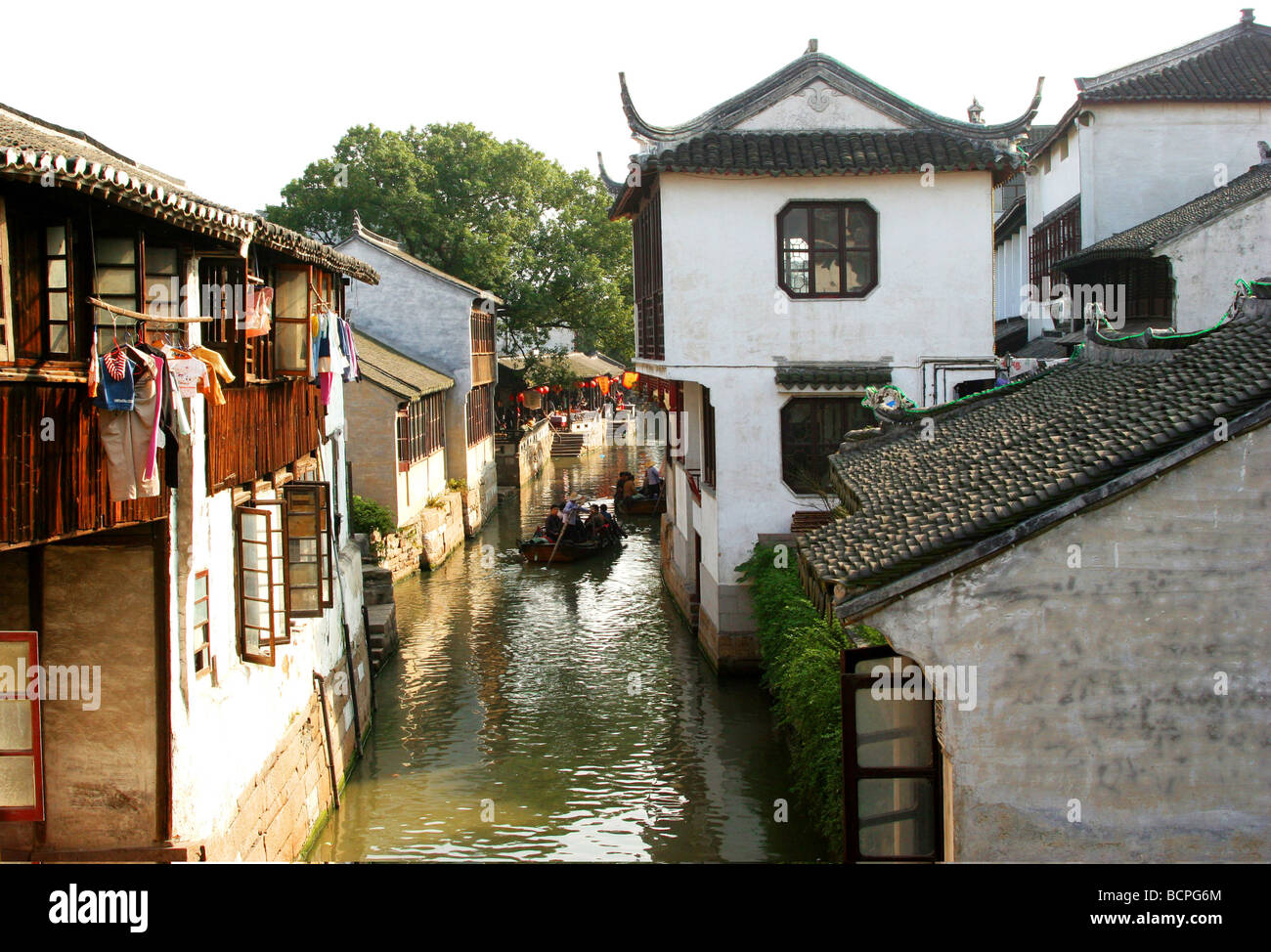 Narrow waterway and traditional riverside residence, Xitang Water Town ...