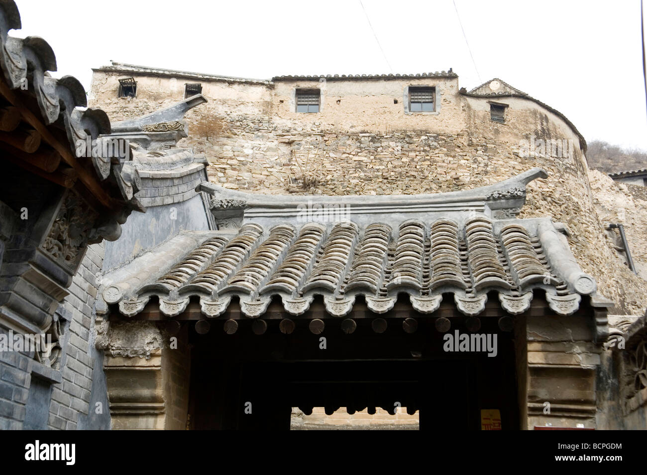 Roof tiles of front gate in a traditional style house, Chuandixia ...