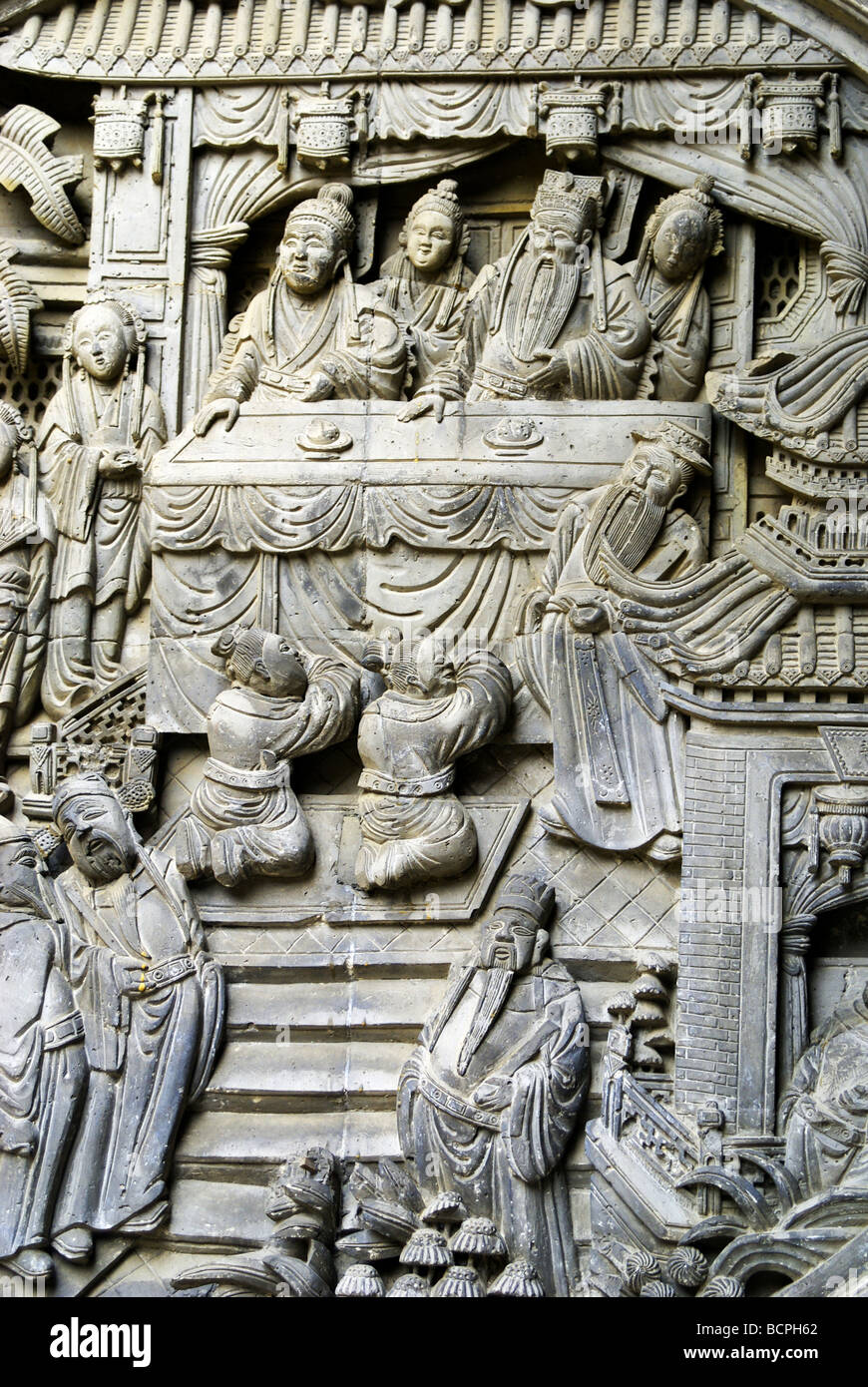 Details of Stone carved wall decorating depicting ancient folklore ...