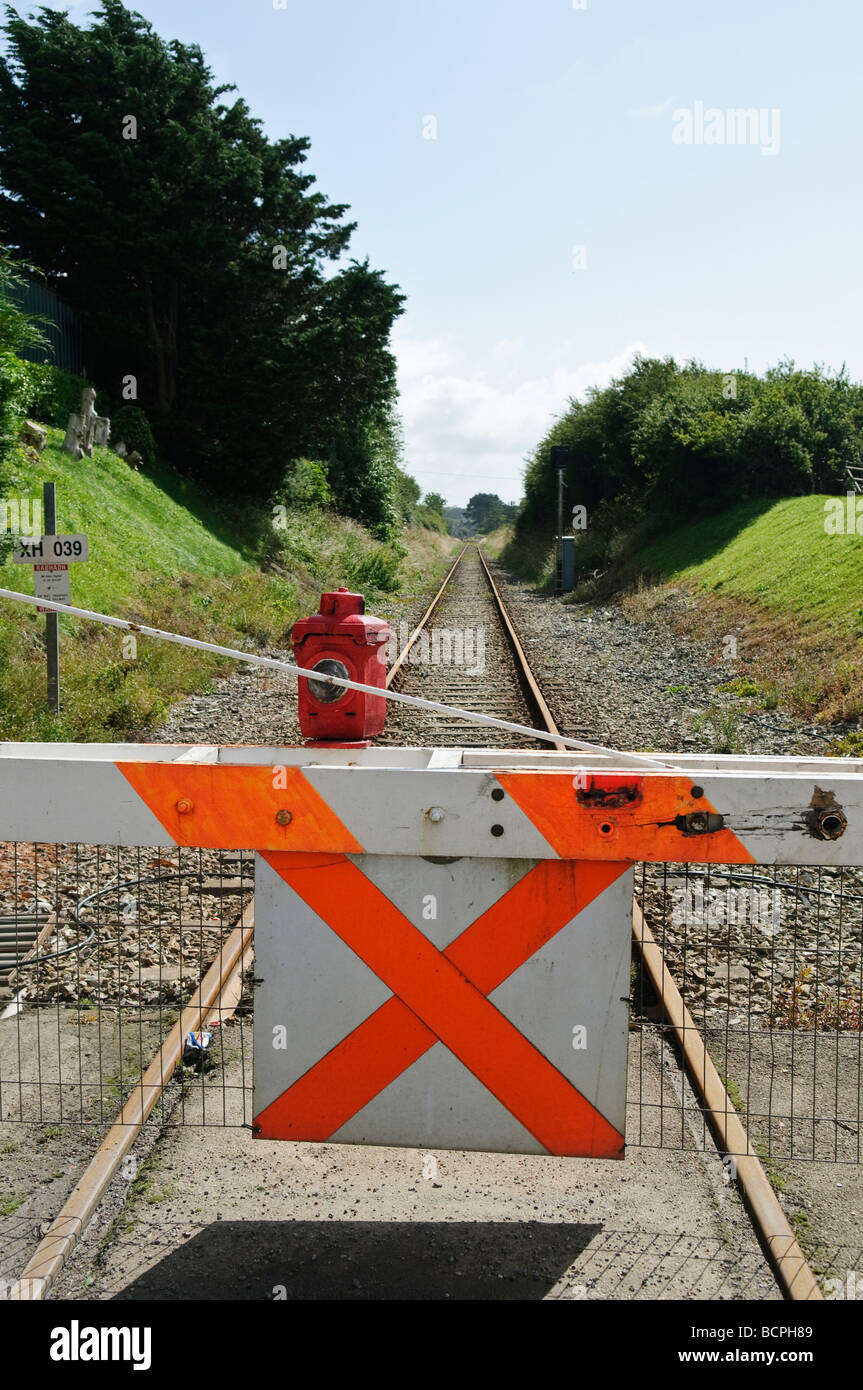 Manually operated level crossing barrier with paraffin warning lamp ...