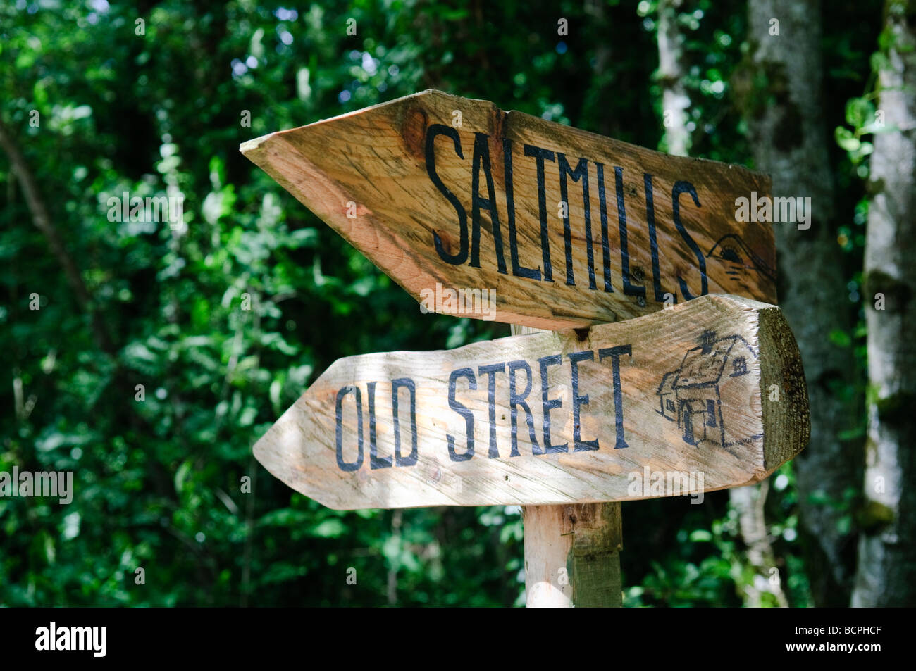Wooden road signs hi-res stock photography and images - Alamy