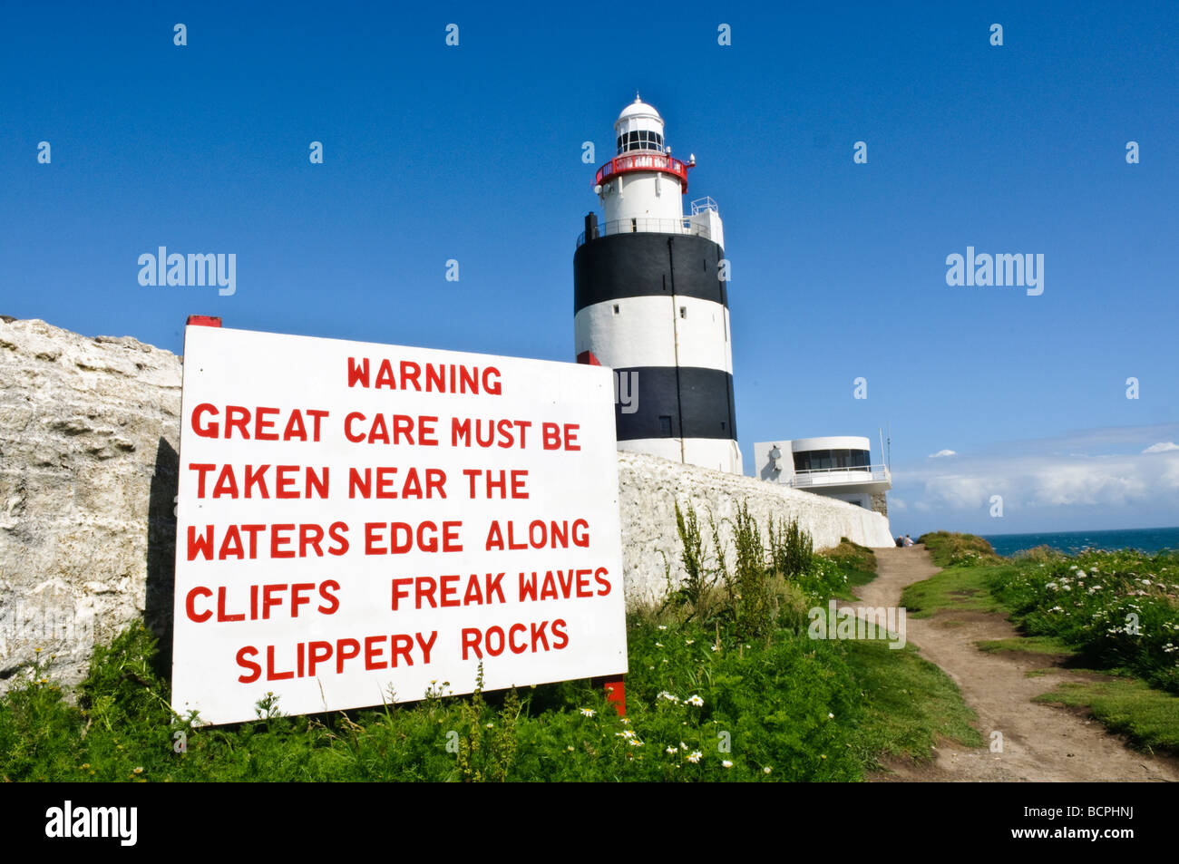 Warning sign at Hook Lighthouse, Hook Peninsula, County Wexford, built ...