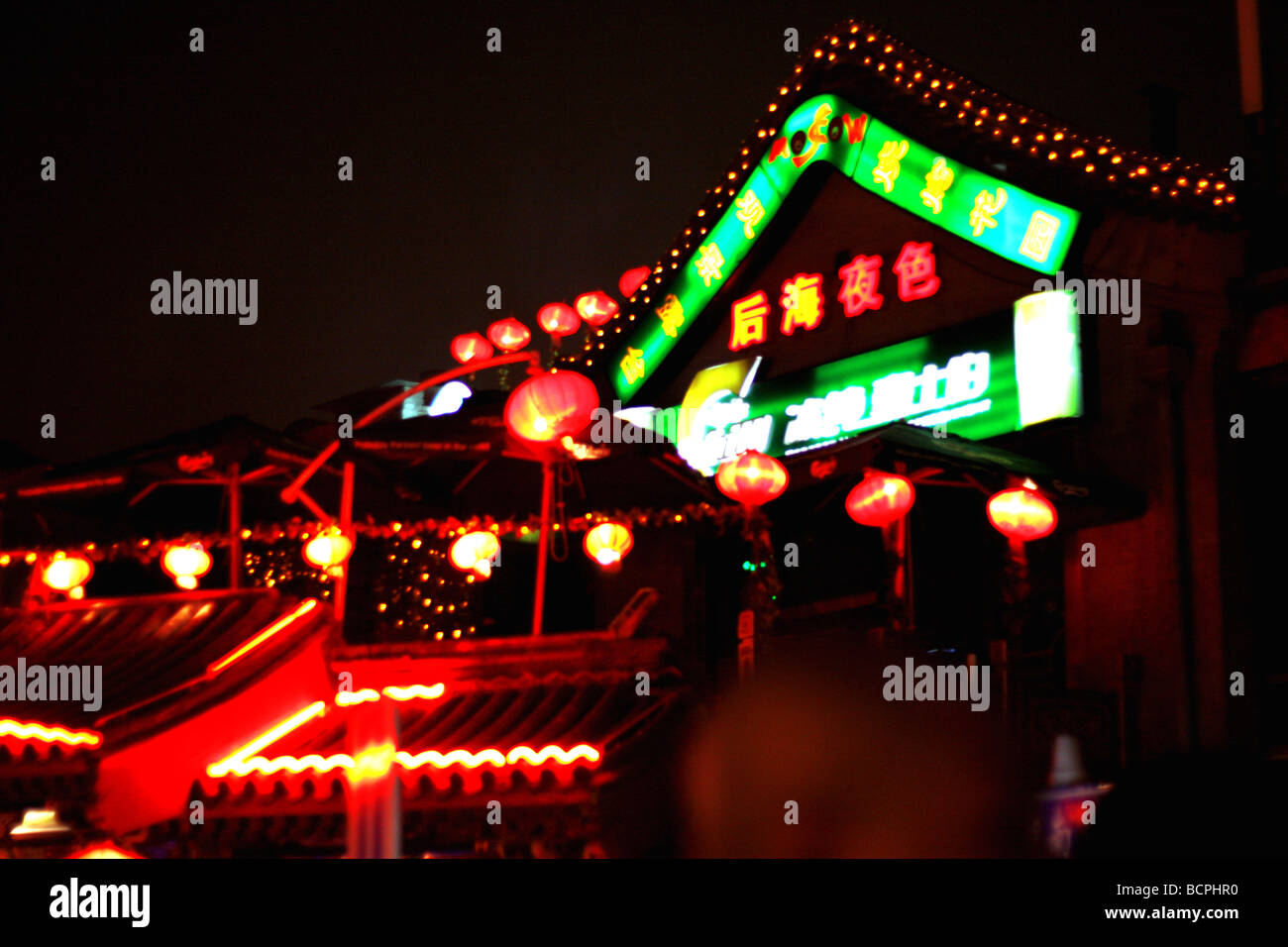 Bars lit by neon lights, Houhai bar area, Beijing, China Stock Photo ...