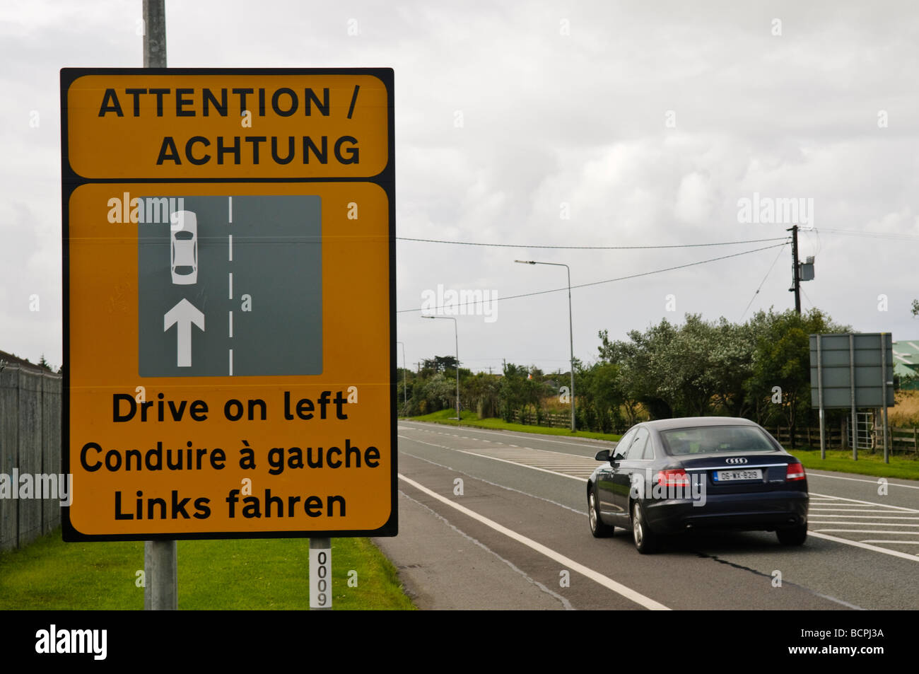 "Drive on the left" reminder sign in English, German and French ...