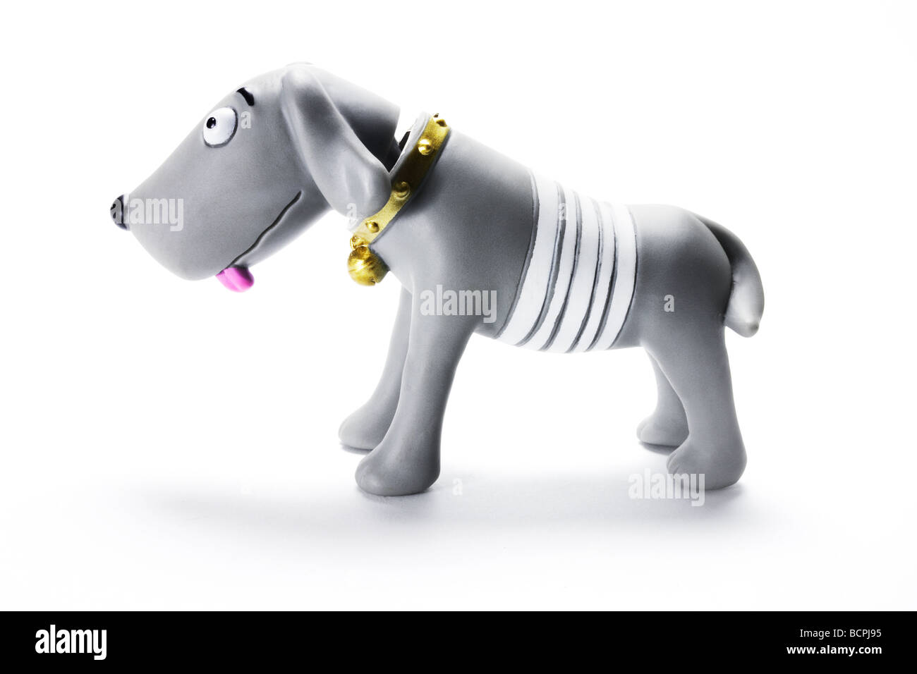 Plastic Dog Figurine Stock Photo - Alamy