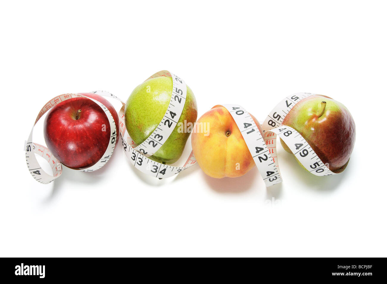 Tape Measure Around Fruits Stock Photo - Alamy