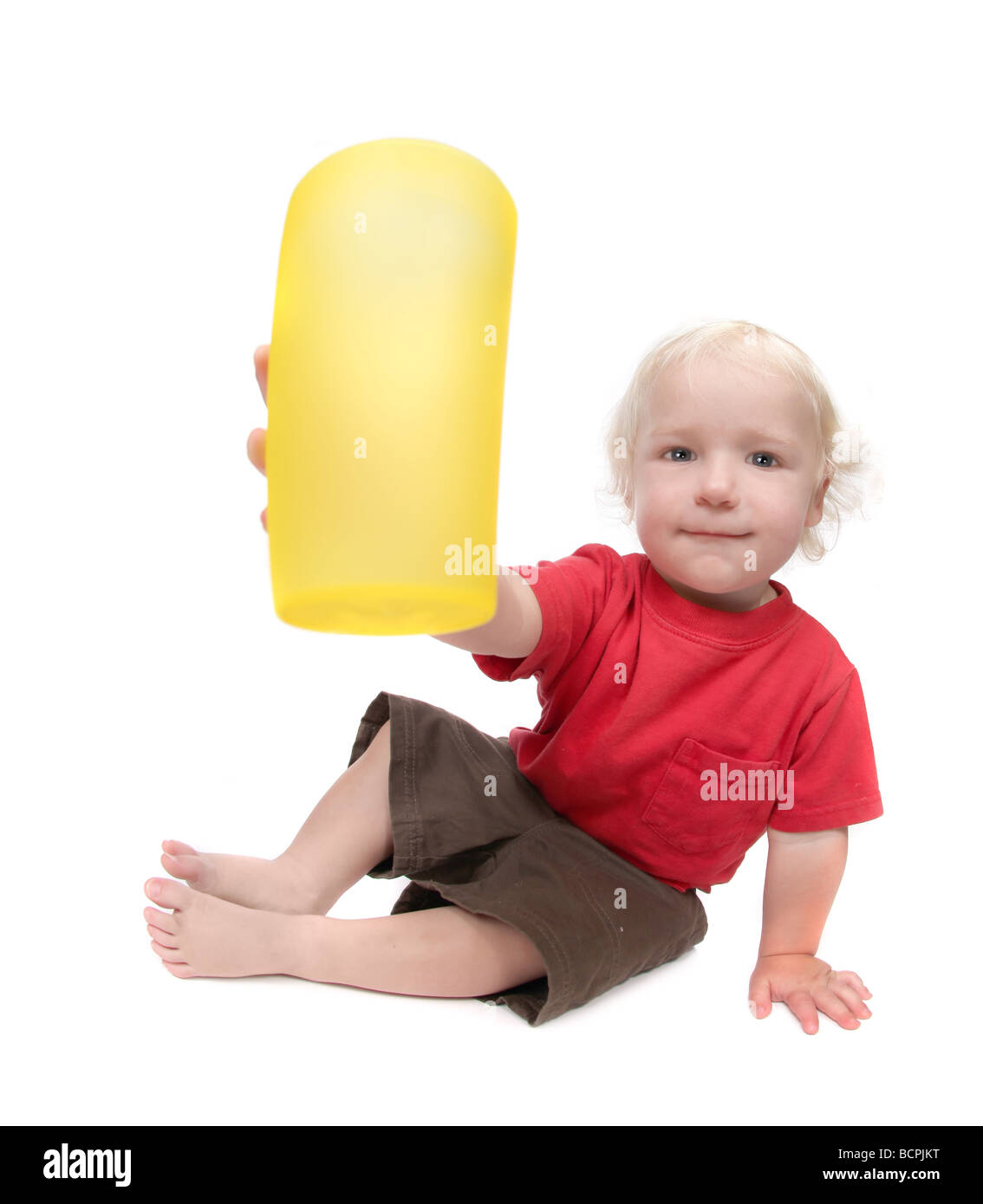 Cute Baby Boy With His Drink Cup on White Background Stock Photo - Alamy