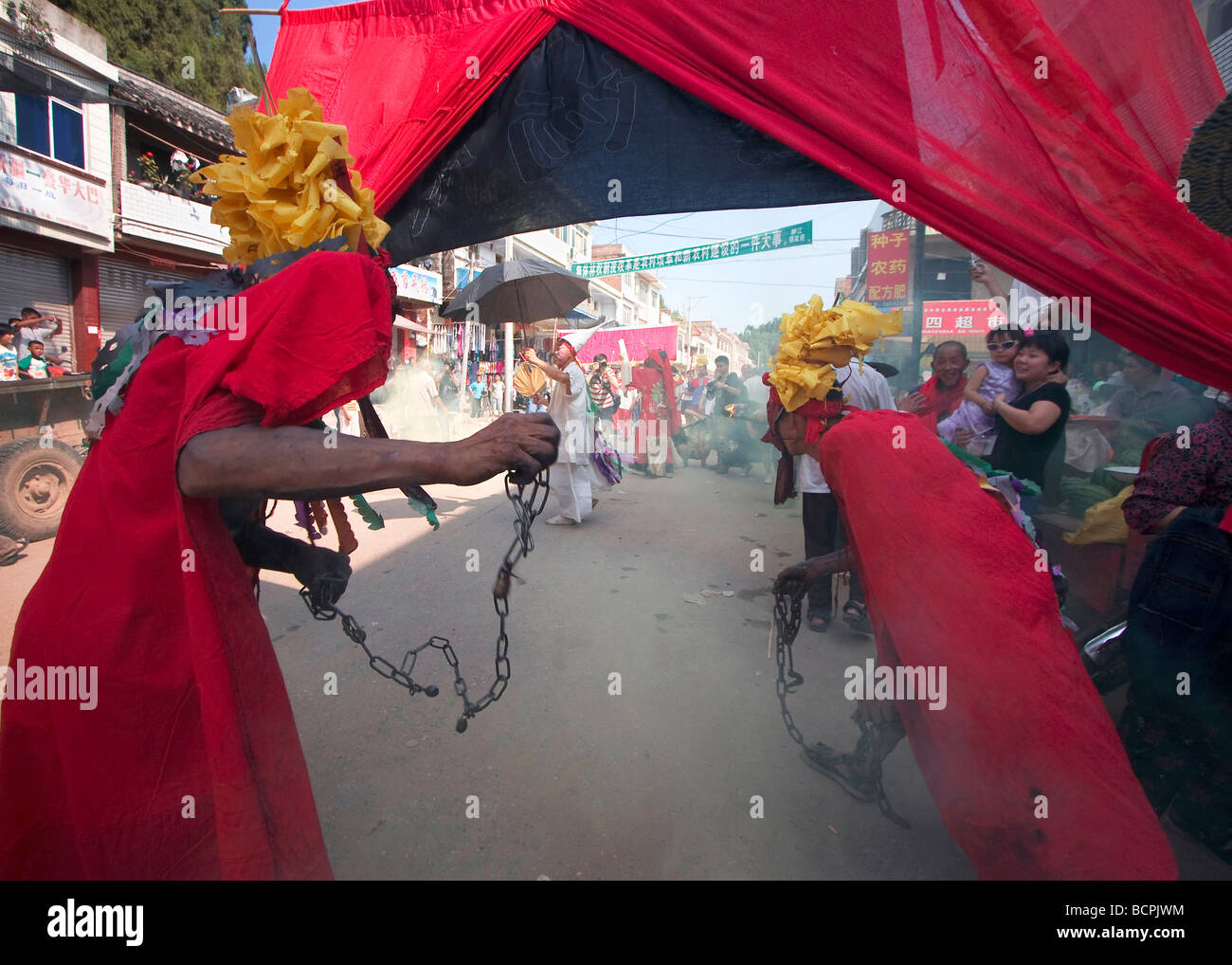 Actors portraying the God of Hell during temple fair, Qijiang Ancient ...