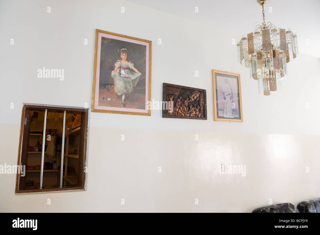 Pictures on wall of hotel reception in African hotel Stock Photo - Alamy