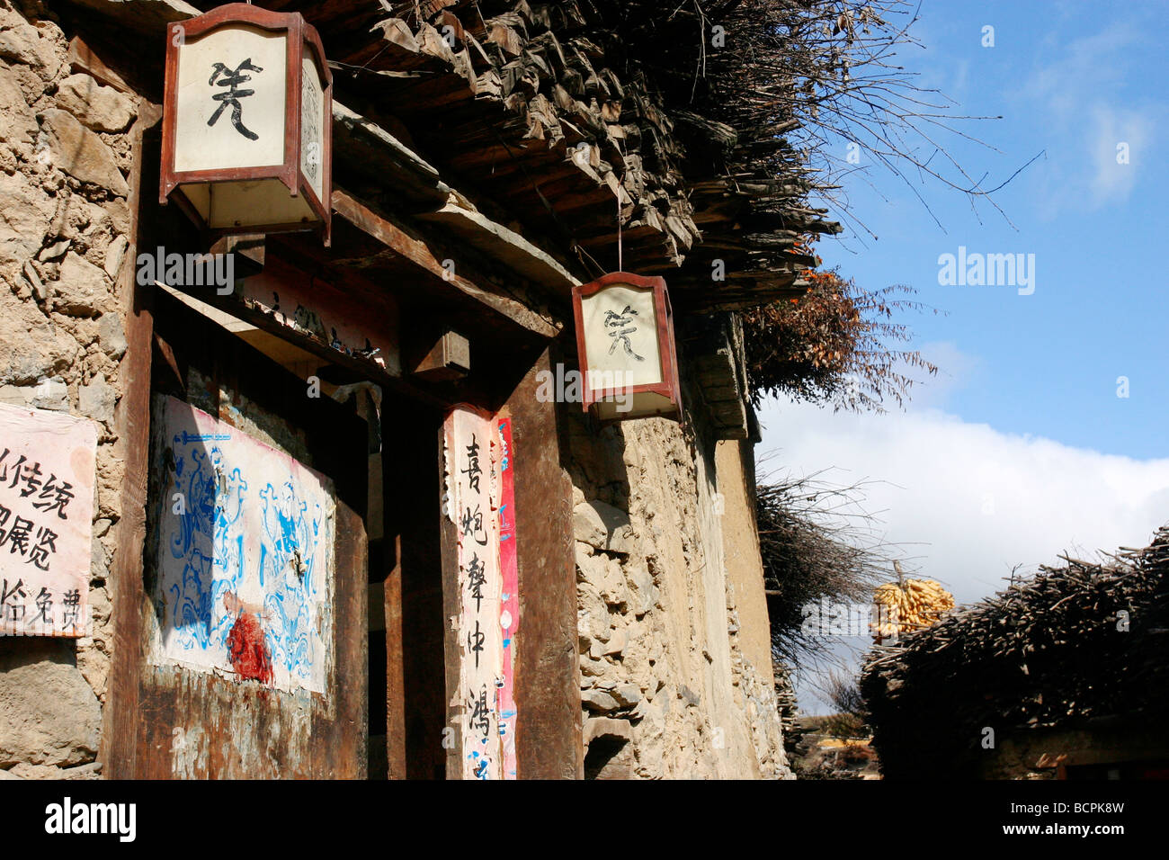 Front gate of a traditional Qiang minority house, Luobozhai Village ...
