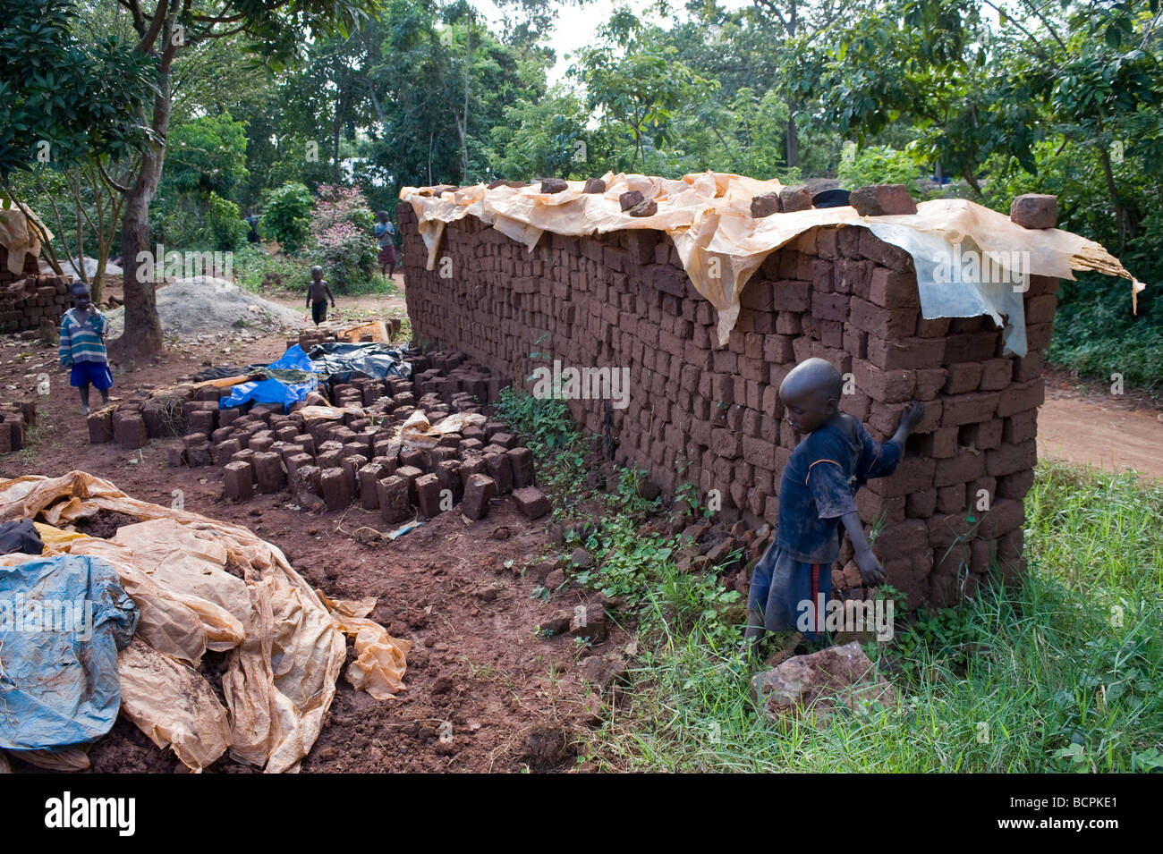 Hand made bricks for sale in front garden in Kampala Uganda Stock Photo ...