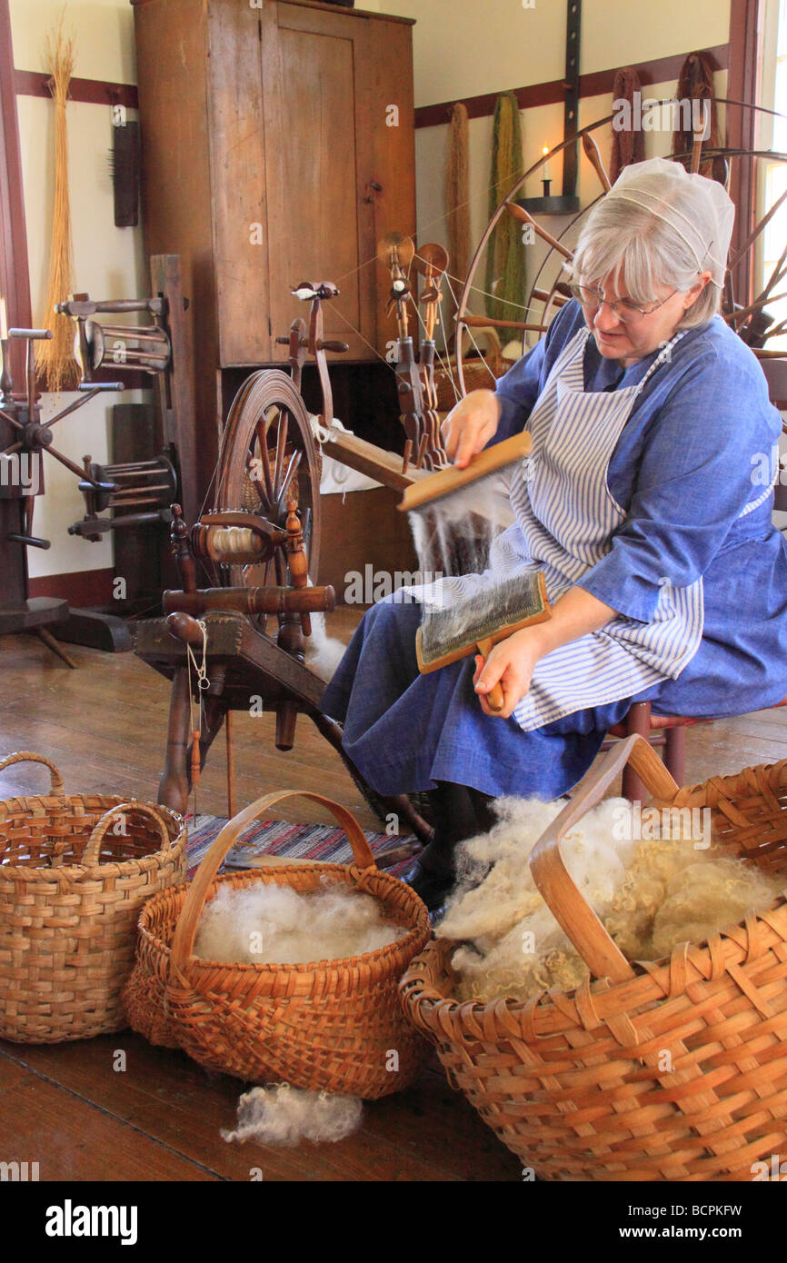 Costumed interpreter cards wool at East Family Sisters Shop at Shaker ...