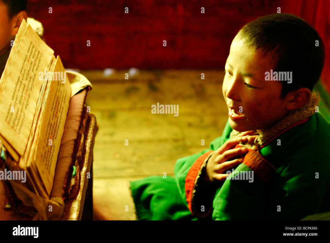 Tibetan boy studying in Tibetan language school, Danba County, Garzê ...
