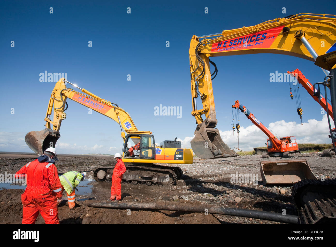 Construction work bringing the electric supply ashore from Robin Rigg ...