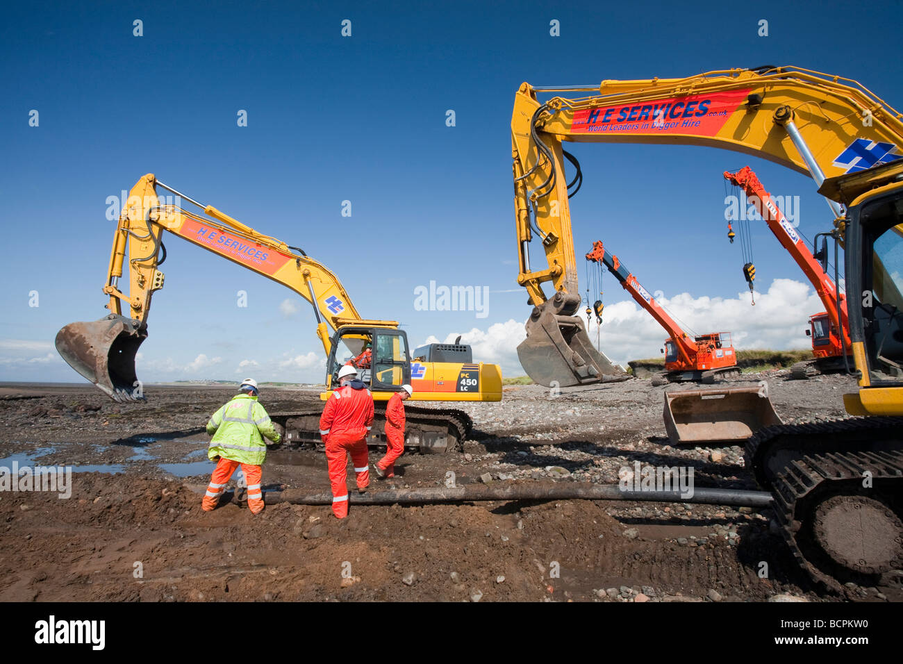 Construction work bringing the electric supply ashore from Robin Rigg ...