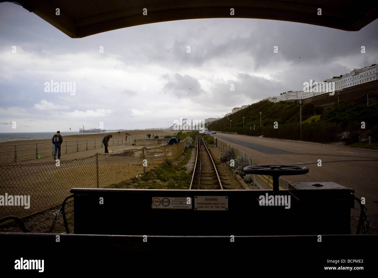 Brighton tourist train along the beach Stock Photo - Alamy