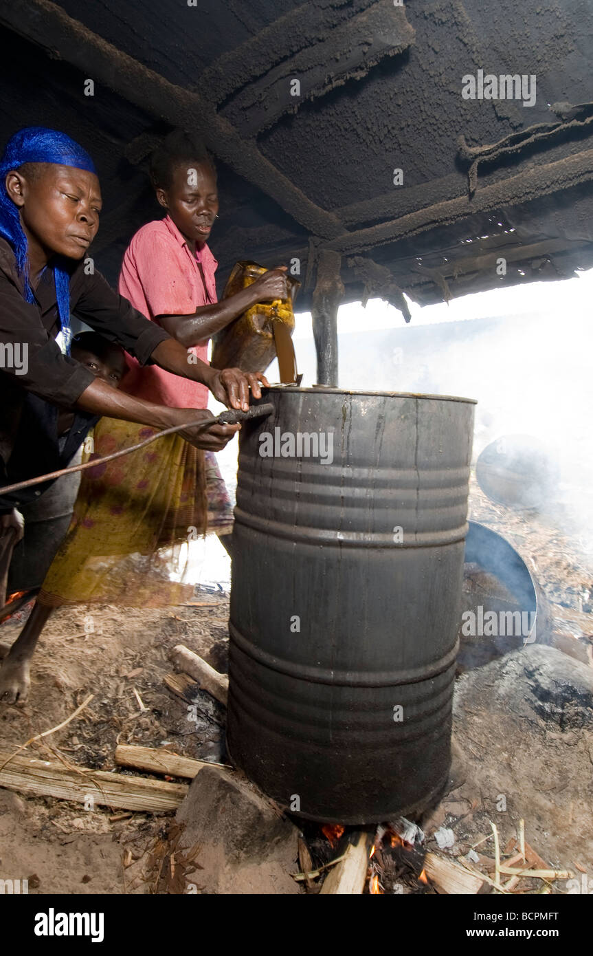 Gin making in back woods distillery, rural Uganda Stock Photo - Alamy