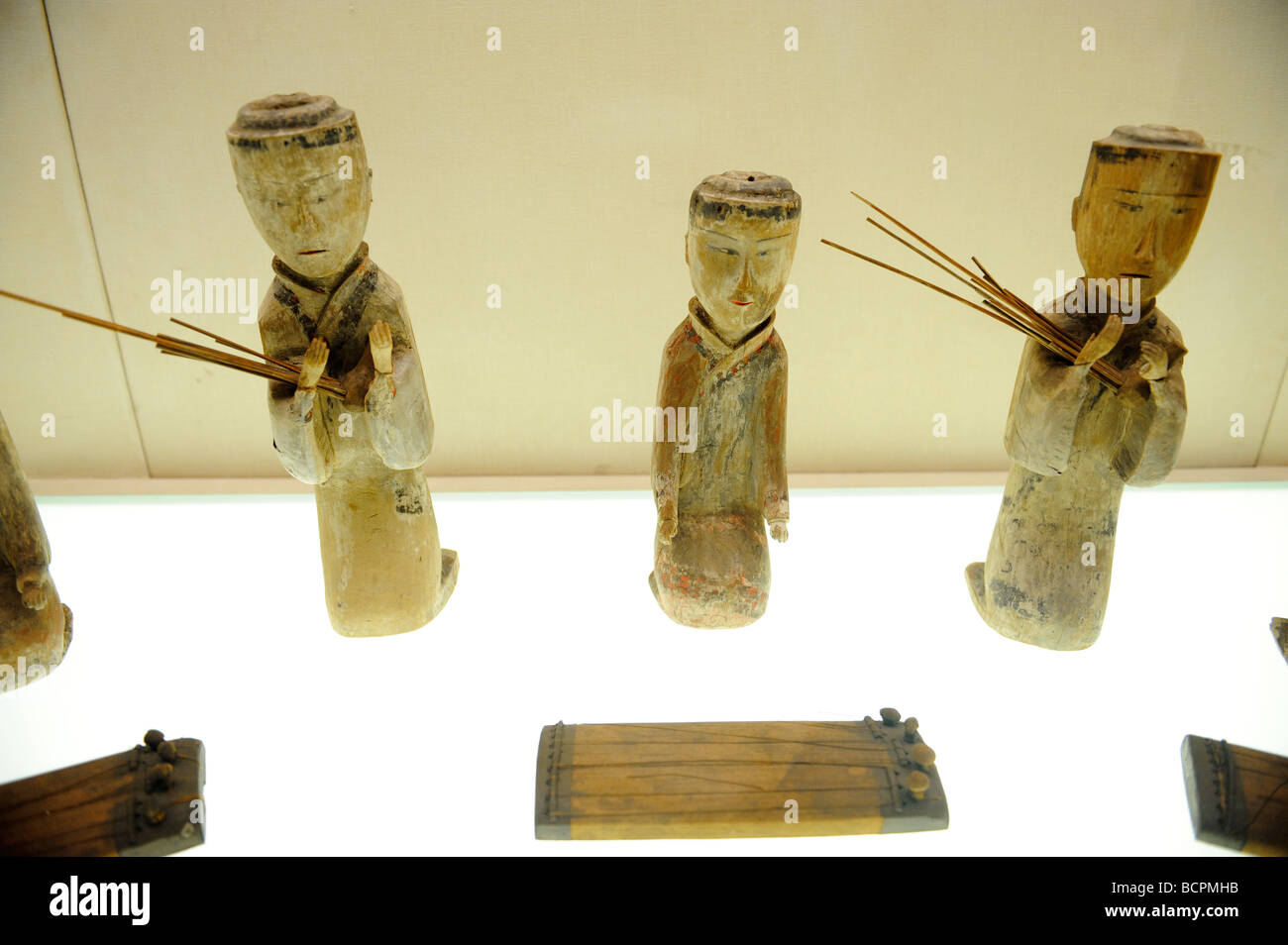Clay servant figurines and clay miniature musical instrument excavated ...