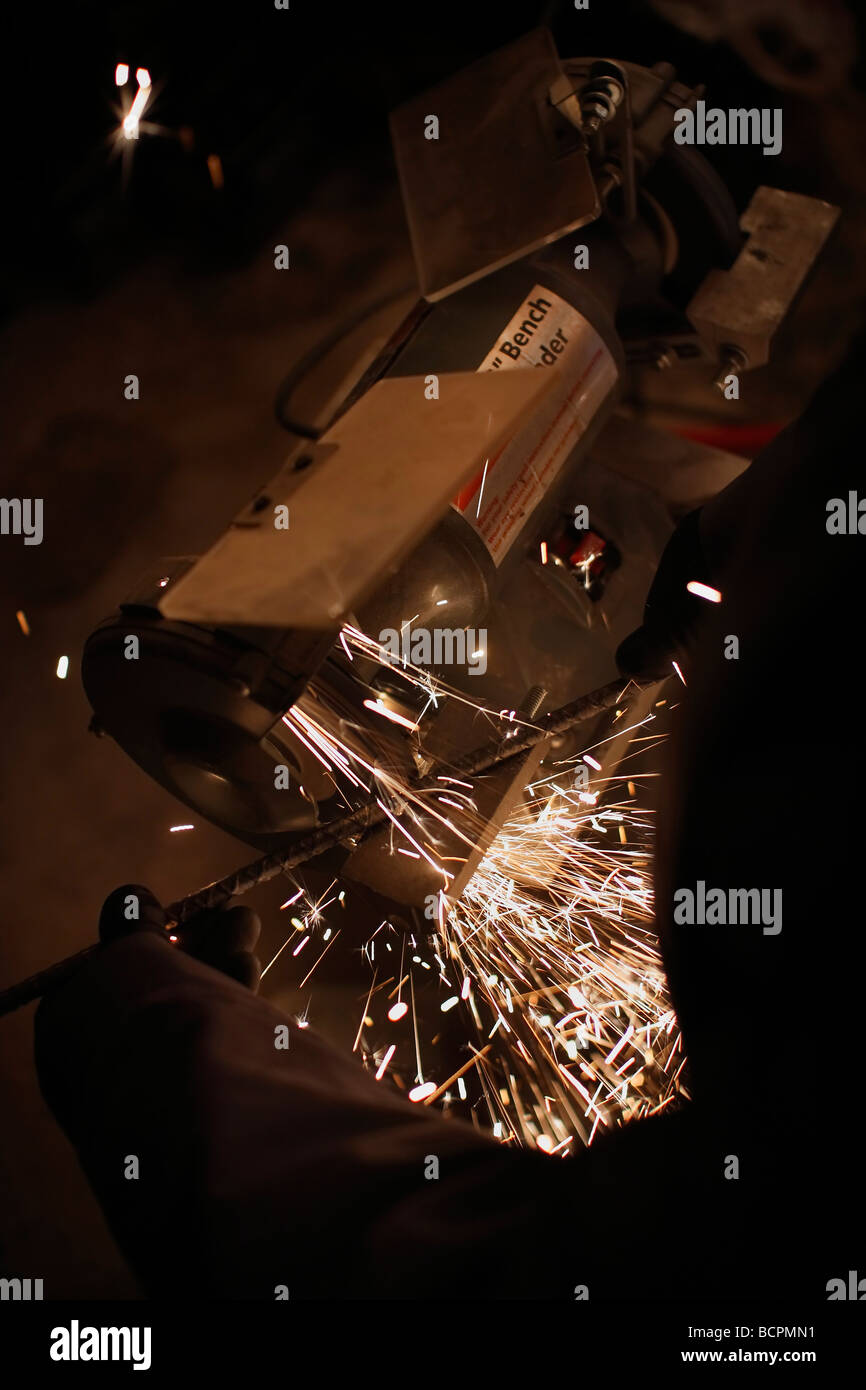 Workers using a grinder hi-res stock photography and images - Alamy