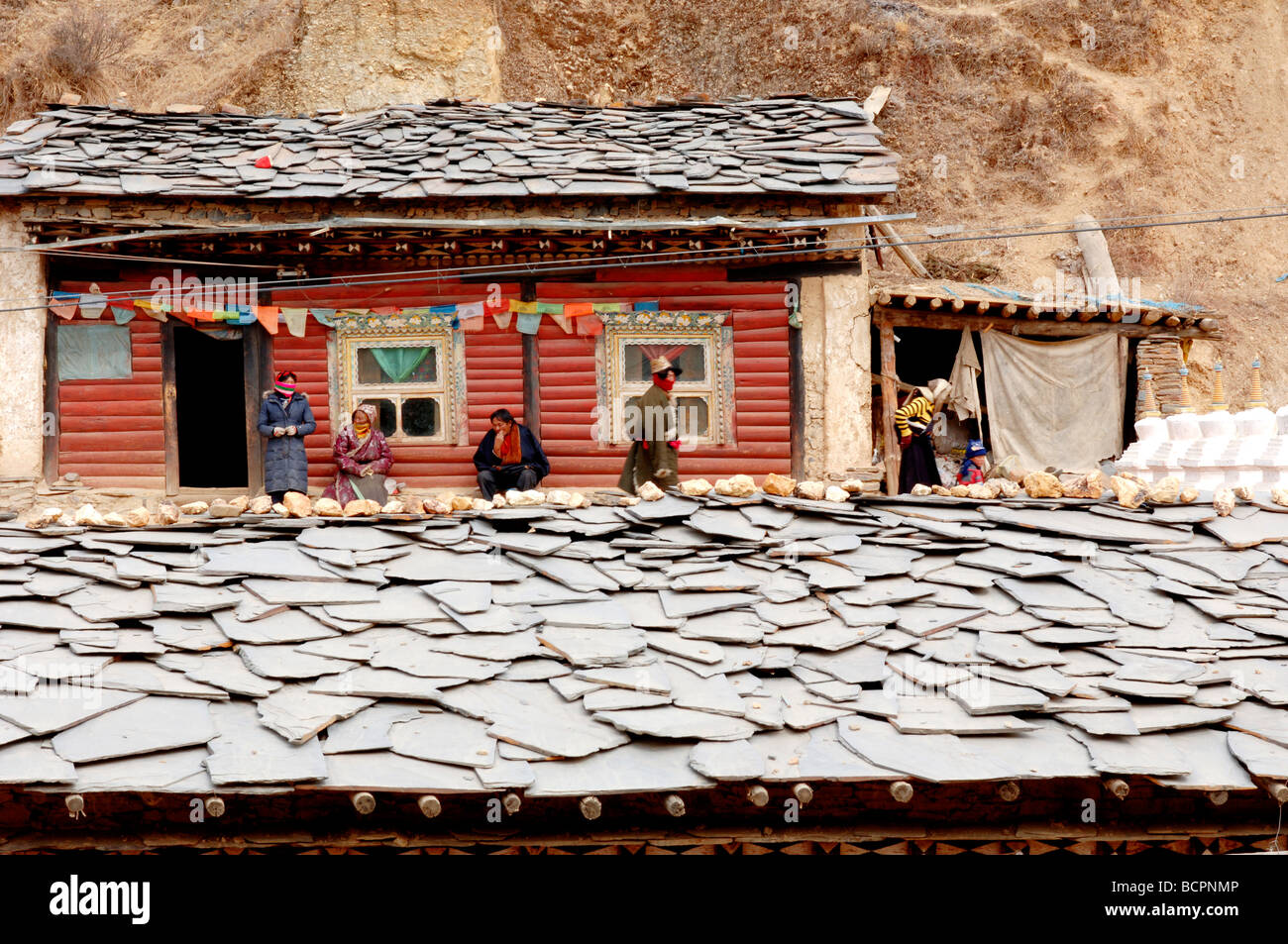 Traditional Tibetan house with stone roof, Garzê Tibetan Autonomous Prefecture, Sichuan Province ...