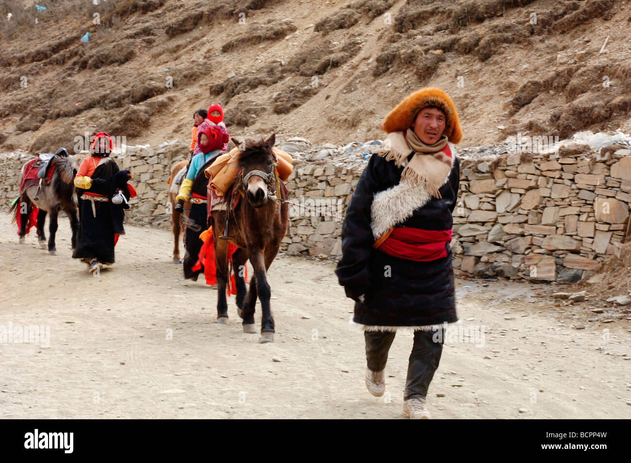 Tibetan family with horses, Garzê Tibetan Autonomous Prefecture ...