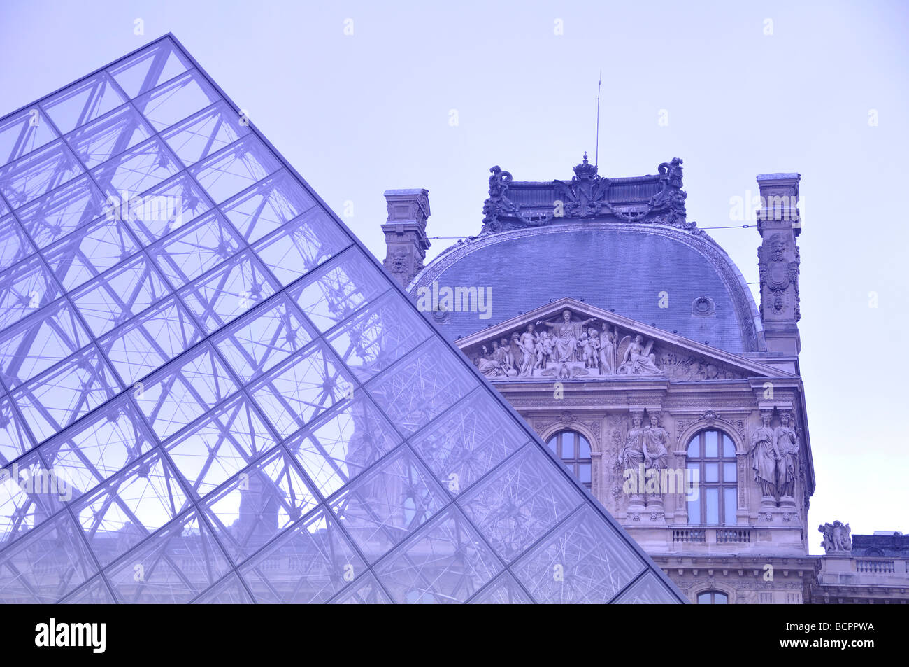 Louvre pyramid in Paris at sunrise, France Stock Photo - Alamy
