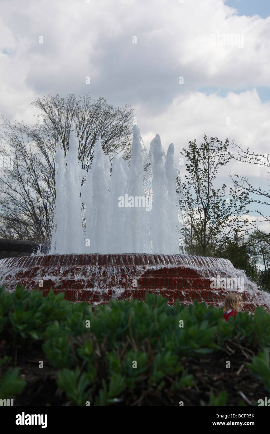 View of fountain water gushes from the fountain against the blue sky in ...