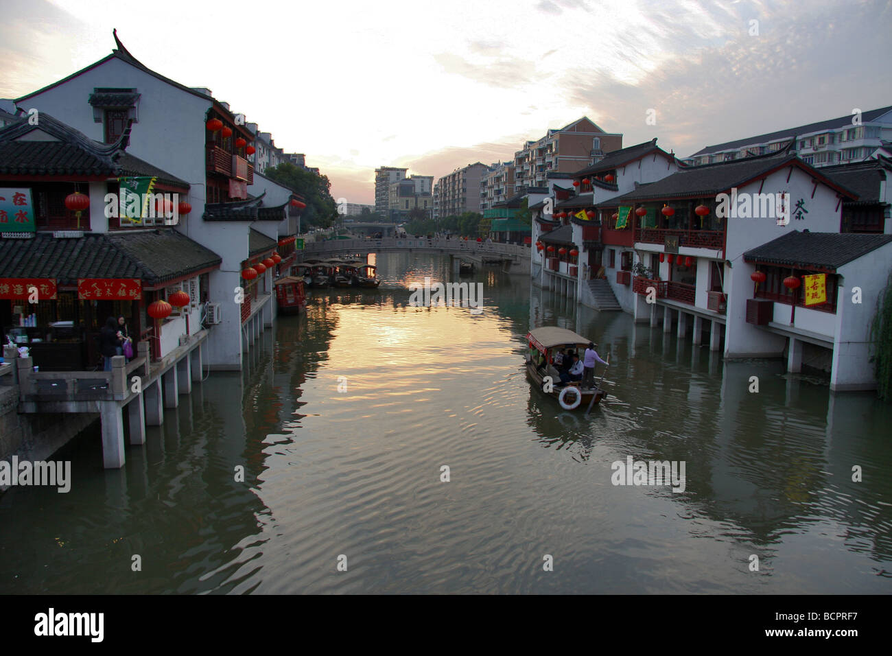Boat rowing down the waterway, Qibao Ancient Town, Shanghai, China ...