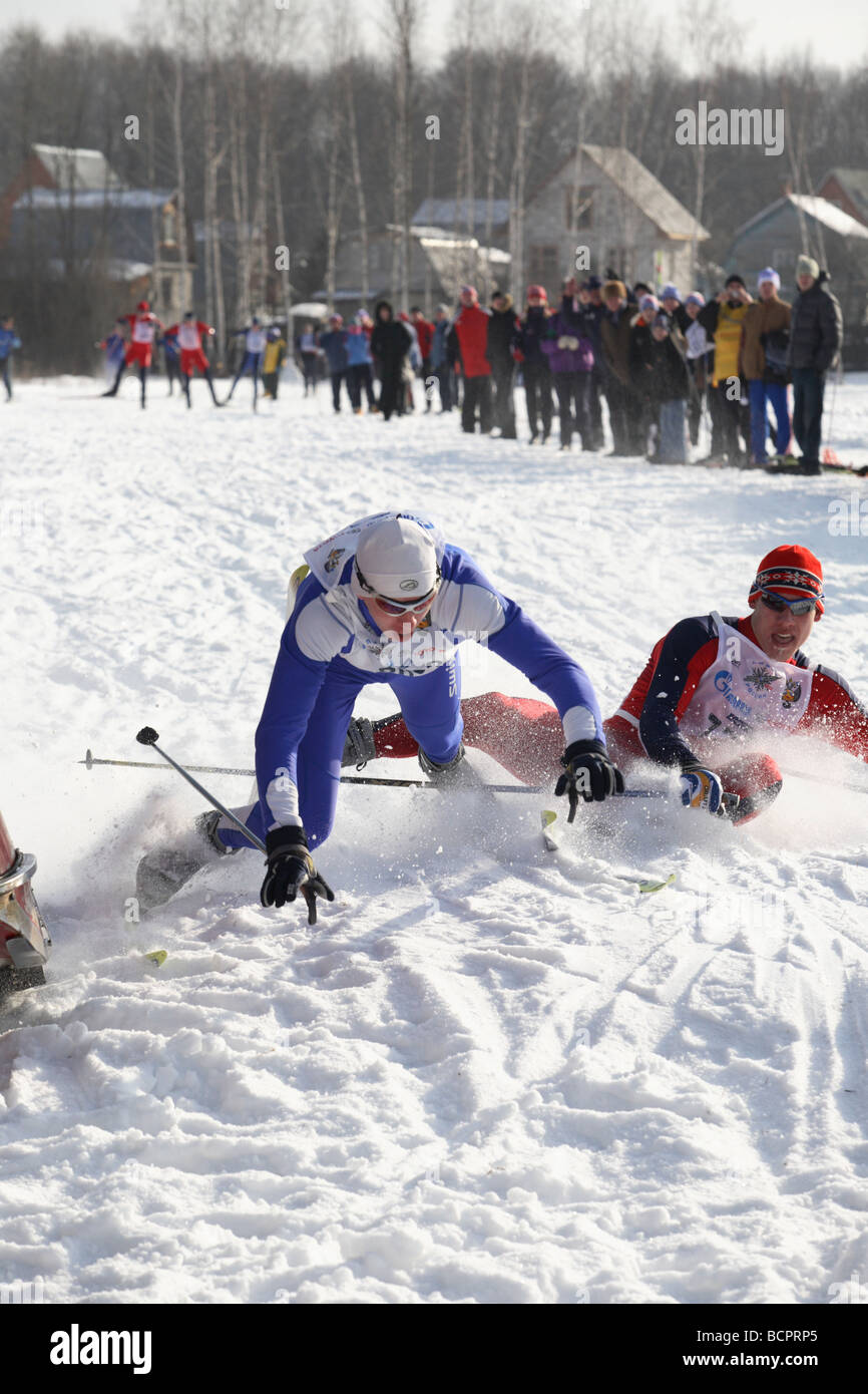 Collision of skiers in finish Stock Photo - Alamy