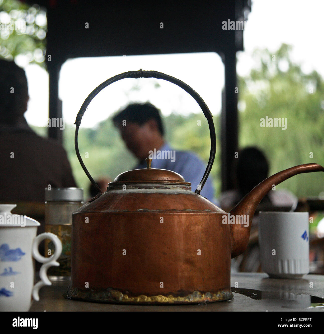 Details of an aged copper tea kettle in a local tea house, Chengdu ...