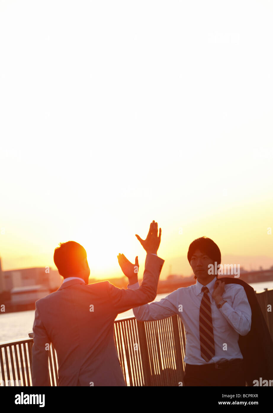 Businessmen coworker high five hi-res stock photography and images - Alamy