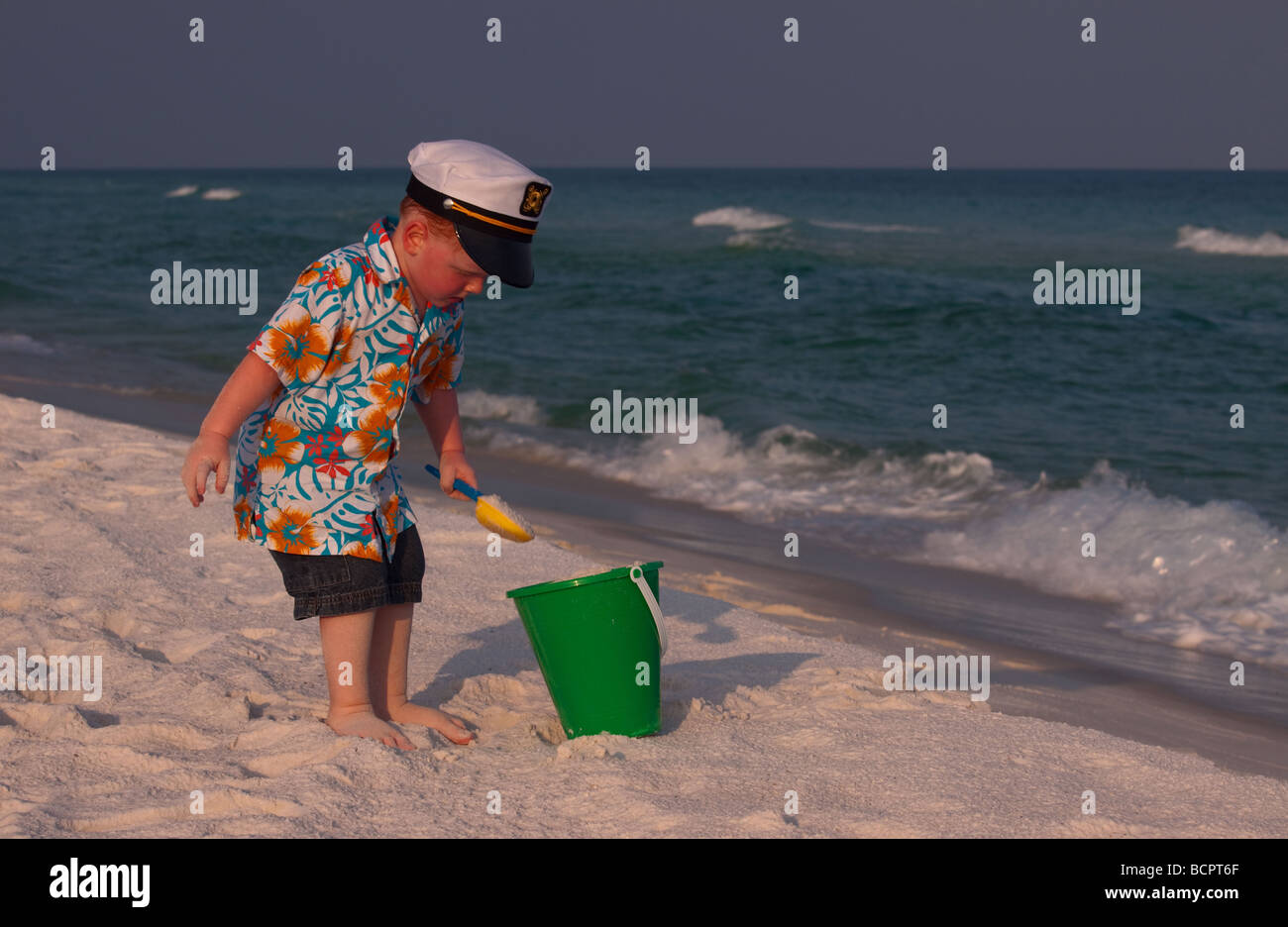 redheaded boy playing on beach Stock Photo - Alamy