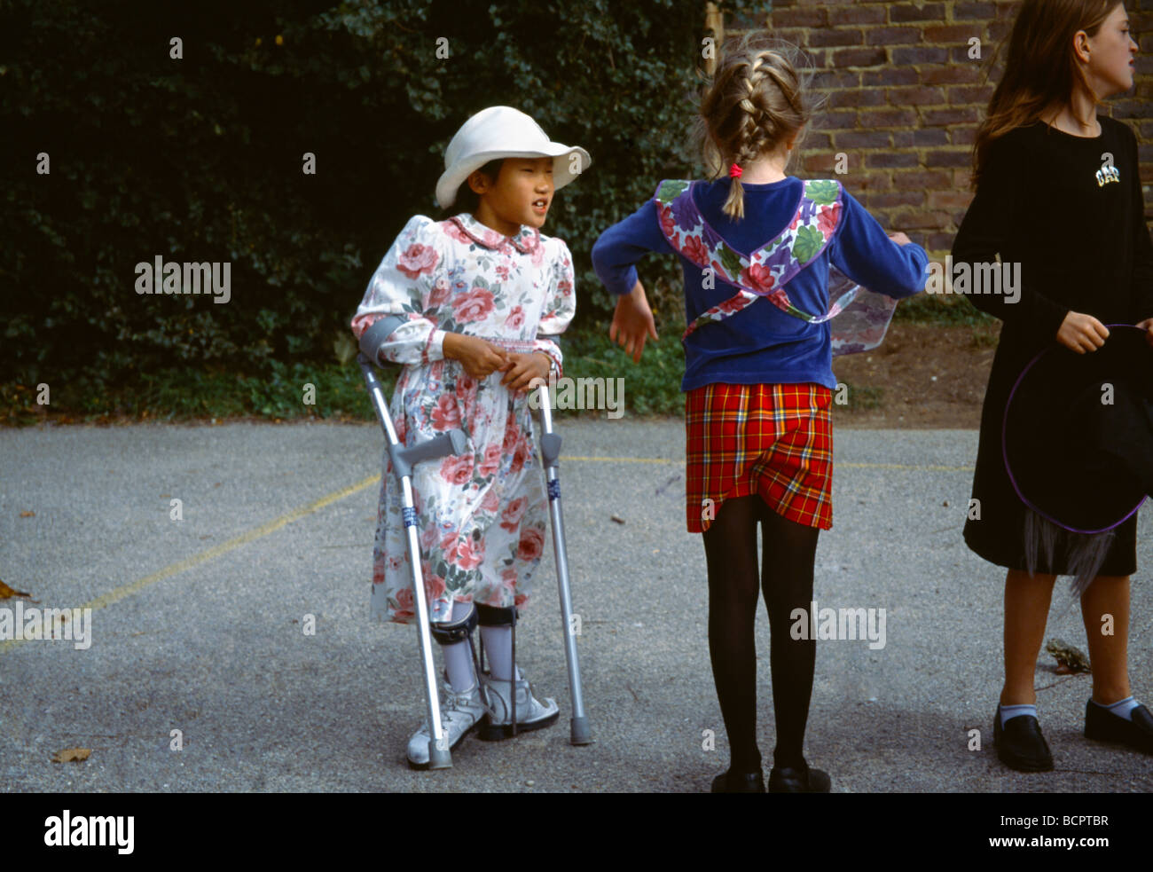Children Dressed Up As Characters On Book Day Disabled Child Playing ...