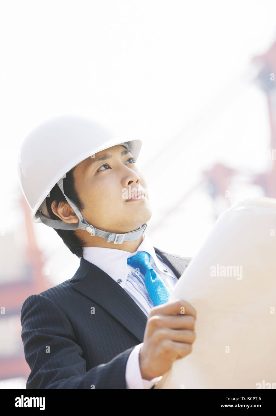 Businessman holding blueprint Stock Photo, Royalty Free Image: 25088510 ...