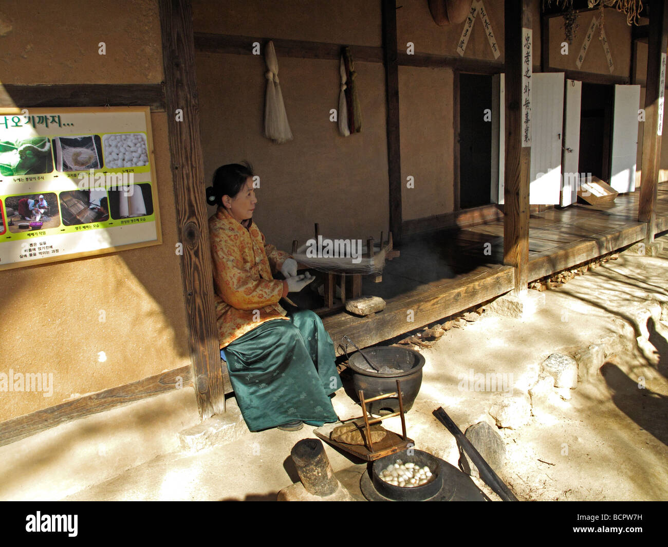 Woman spinning silk South Korea Stock Photo - Alamy