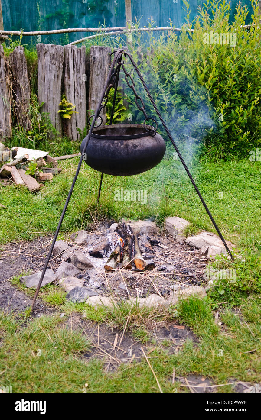 Iron cauldron over a fire in the Irish National Heritage Park, County ...