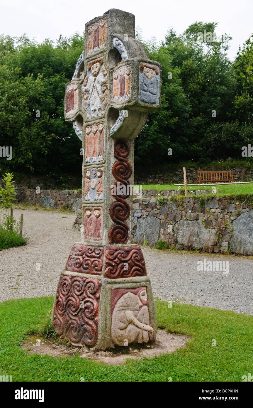 Ornate painted celtic cross with a depictino of Saint Patrick in the ...