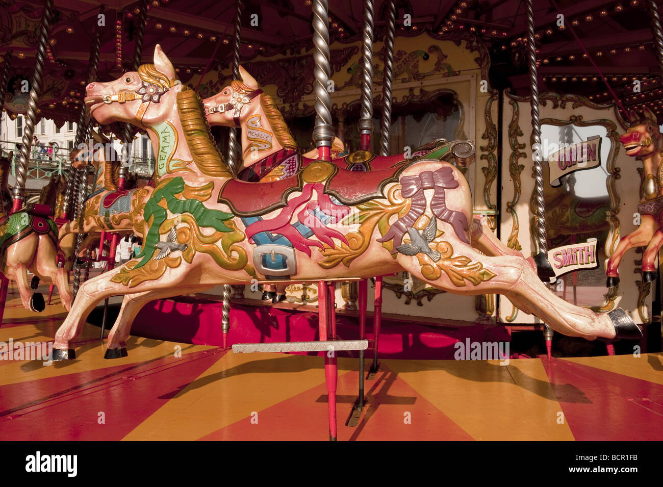 Close-up of traditional fairground carousel merry-go-round style ...