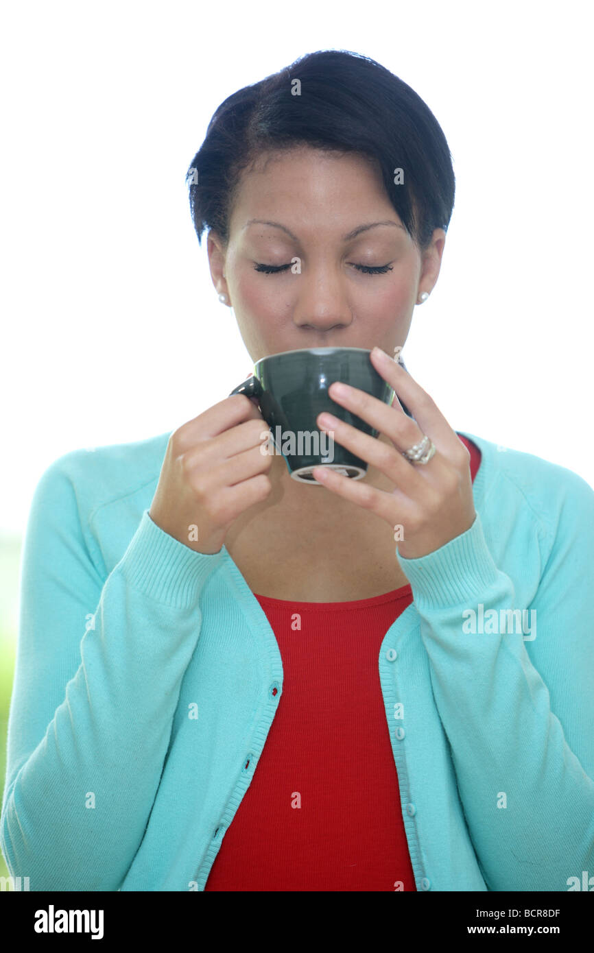 Young Woman Drinking Tea Model Released Stock Photo - Alamy