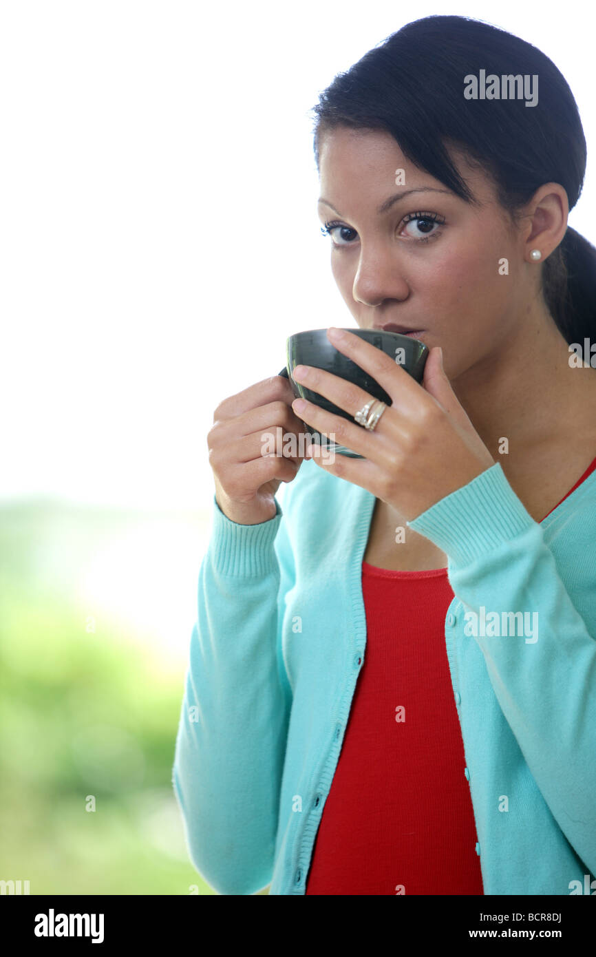 Young Woman Drinking Tea Model Released Stock Photo - Alamy