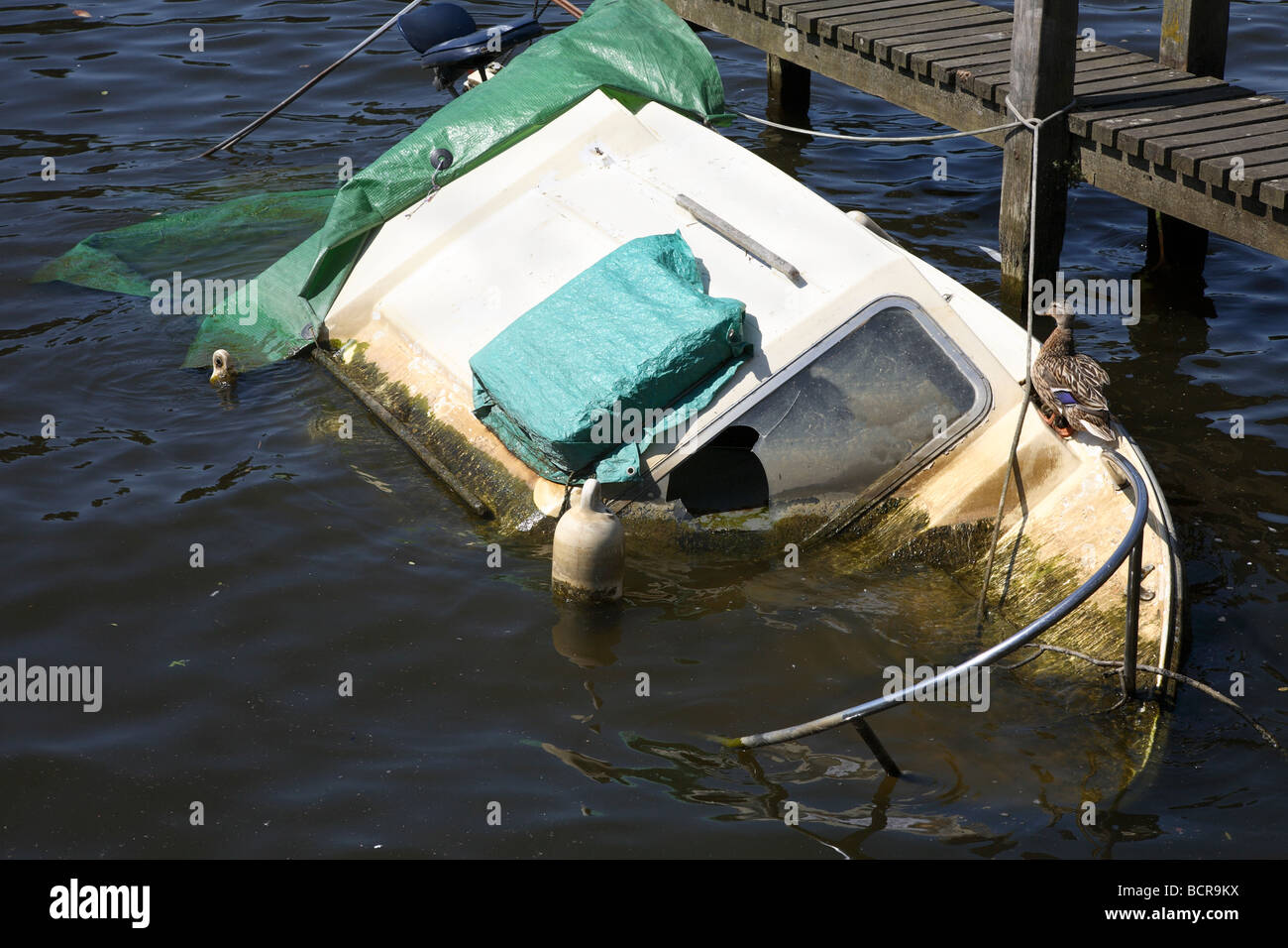 Sinking boat hi-res stock photography and images - Alamy