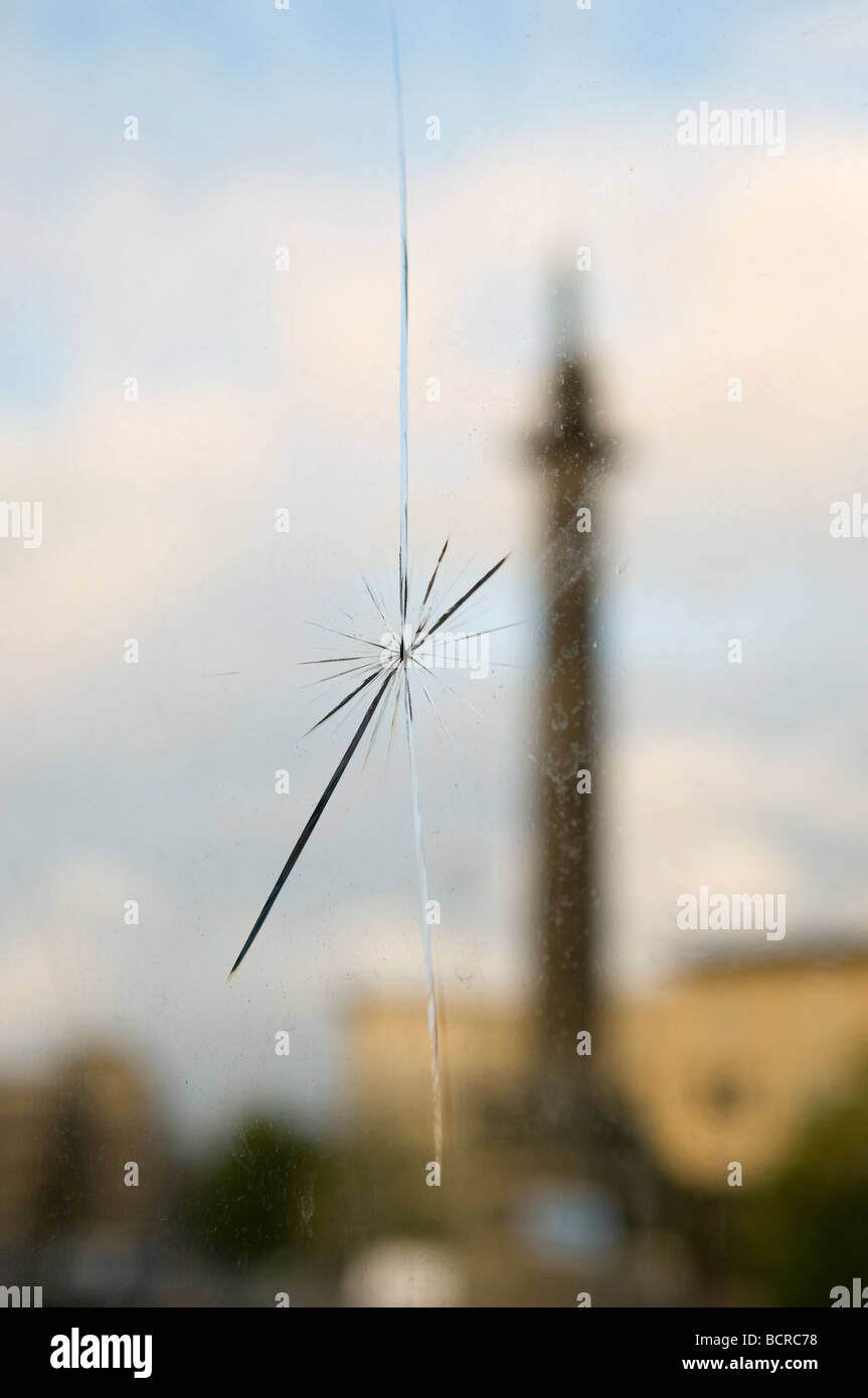 Bullet hole in glass window with Nelsons column in background Stock ...